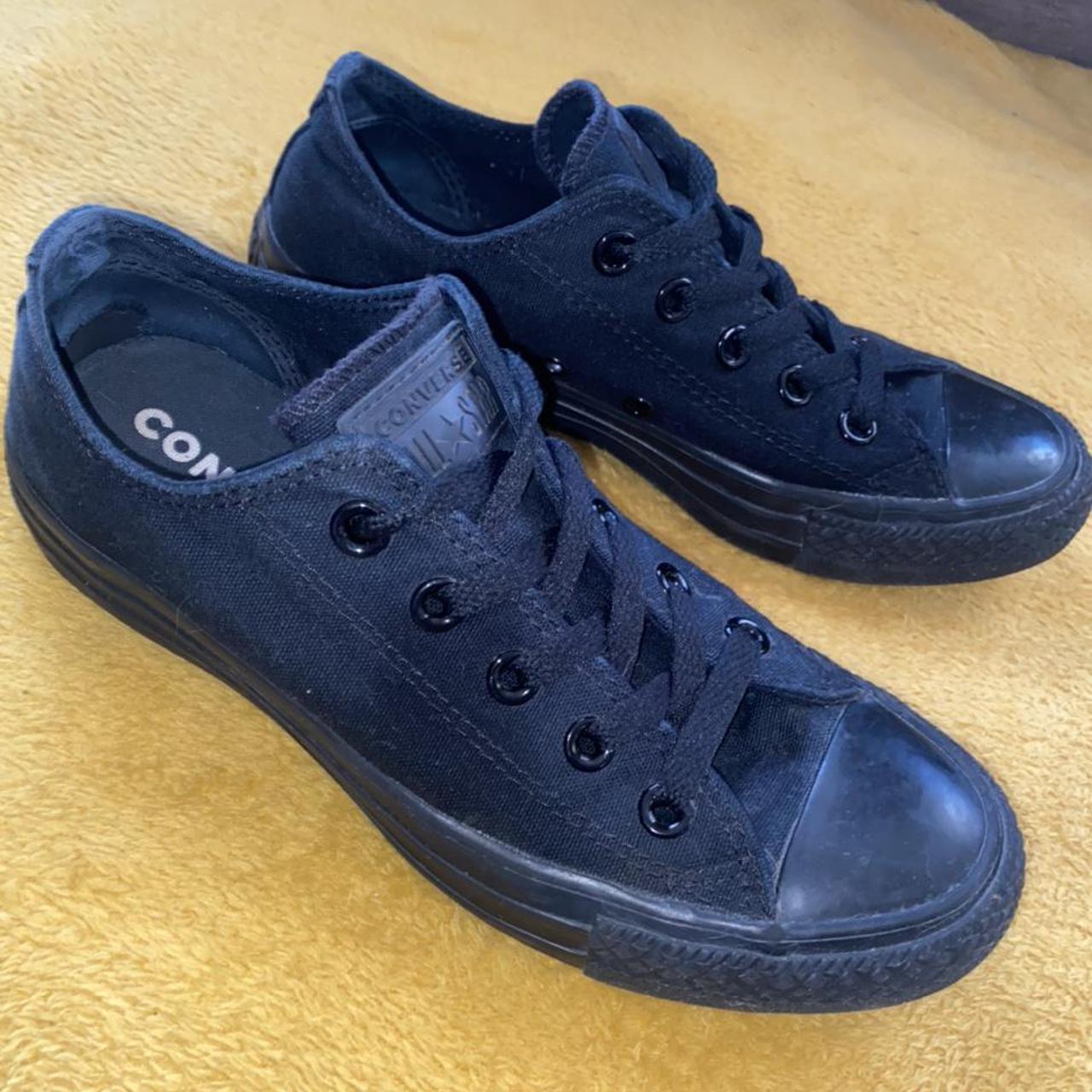 All black low converse Size 4 Good... - Depop