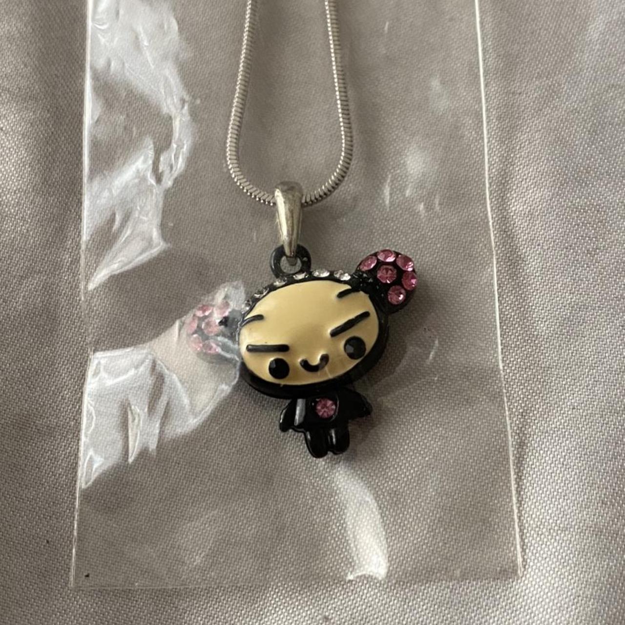 Black and pink Pucca necklace - Depop