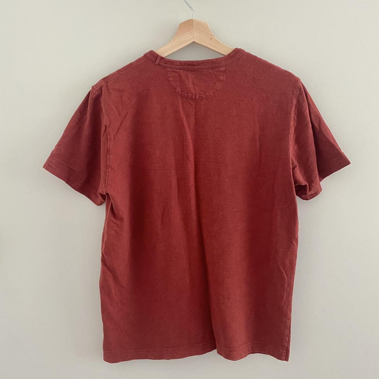 Cozy terra cotta red tee shirt, a classic closet... - Depop