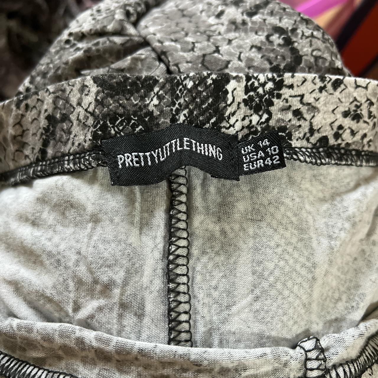 Grey snake skin print flares. Perfect... - Depop