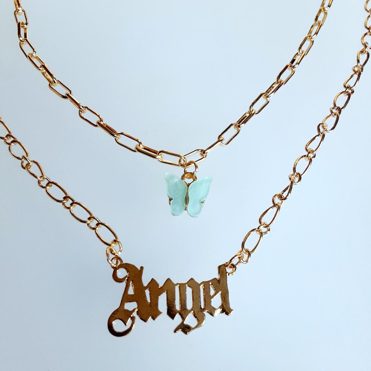 Brand New Two Layered Angel and Butterfly Chain... - Depop