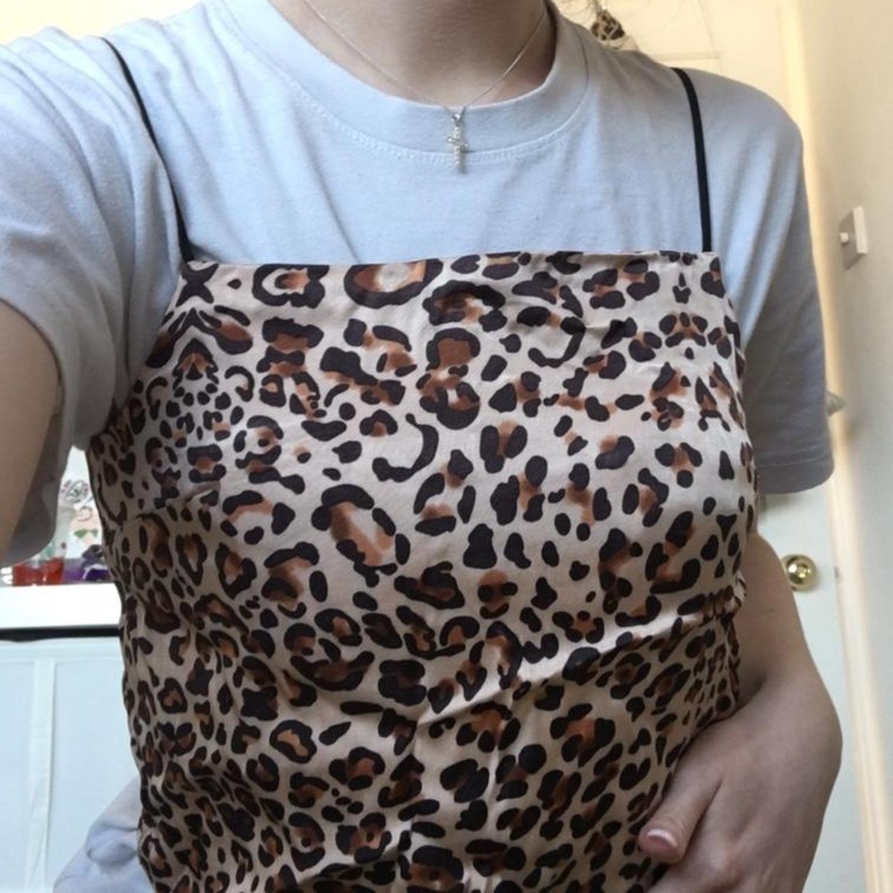 Satin/silk style leopard print spaghetti strap vest... - Depop