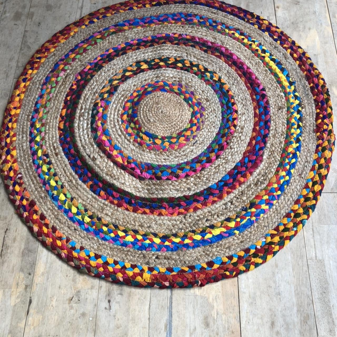 This multi chindi braided round rug contrasts colour... - Depop