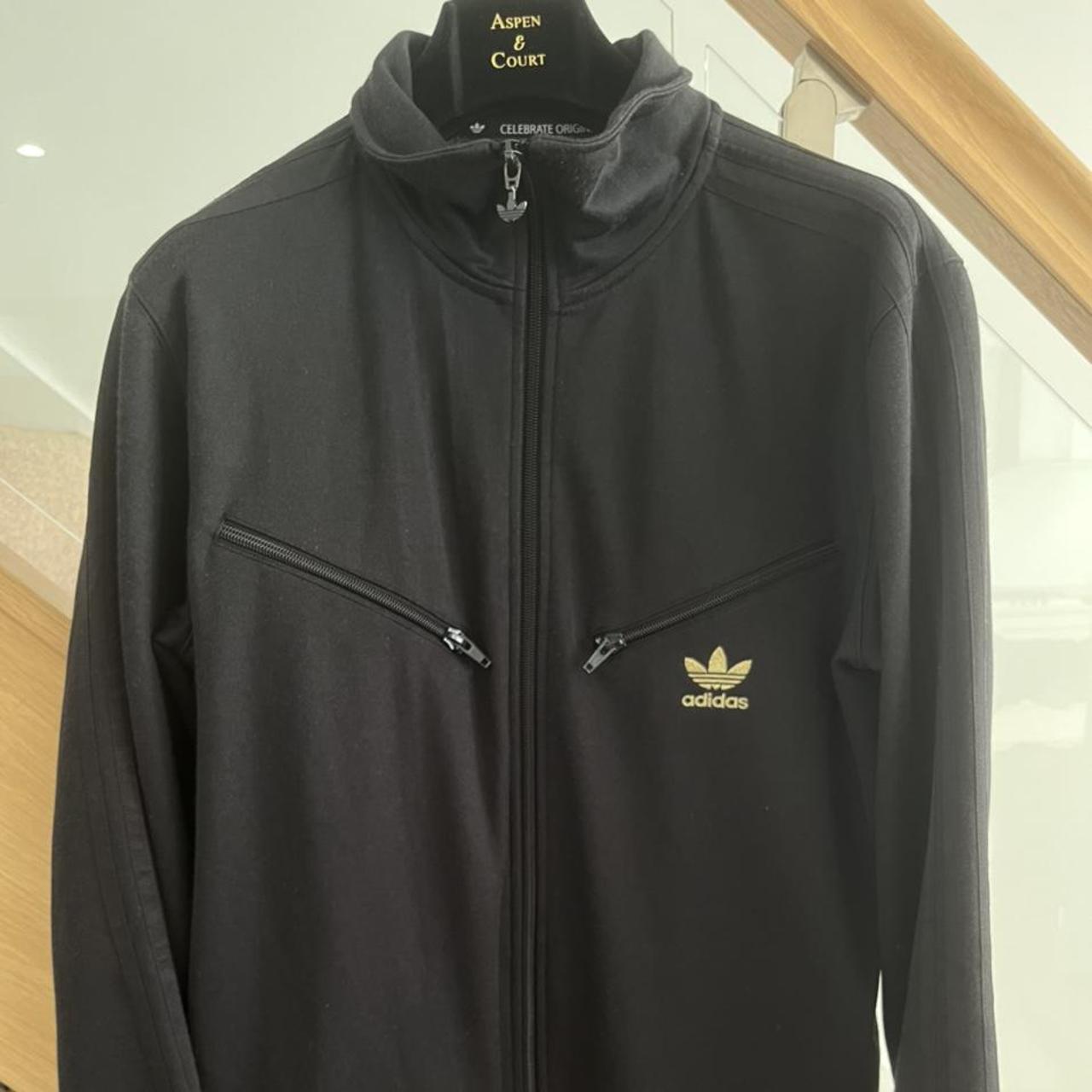 Retro adidas originals black and gold jacket. Size... - Depop
