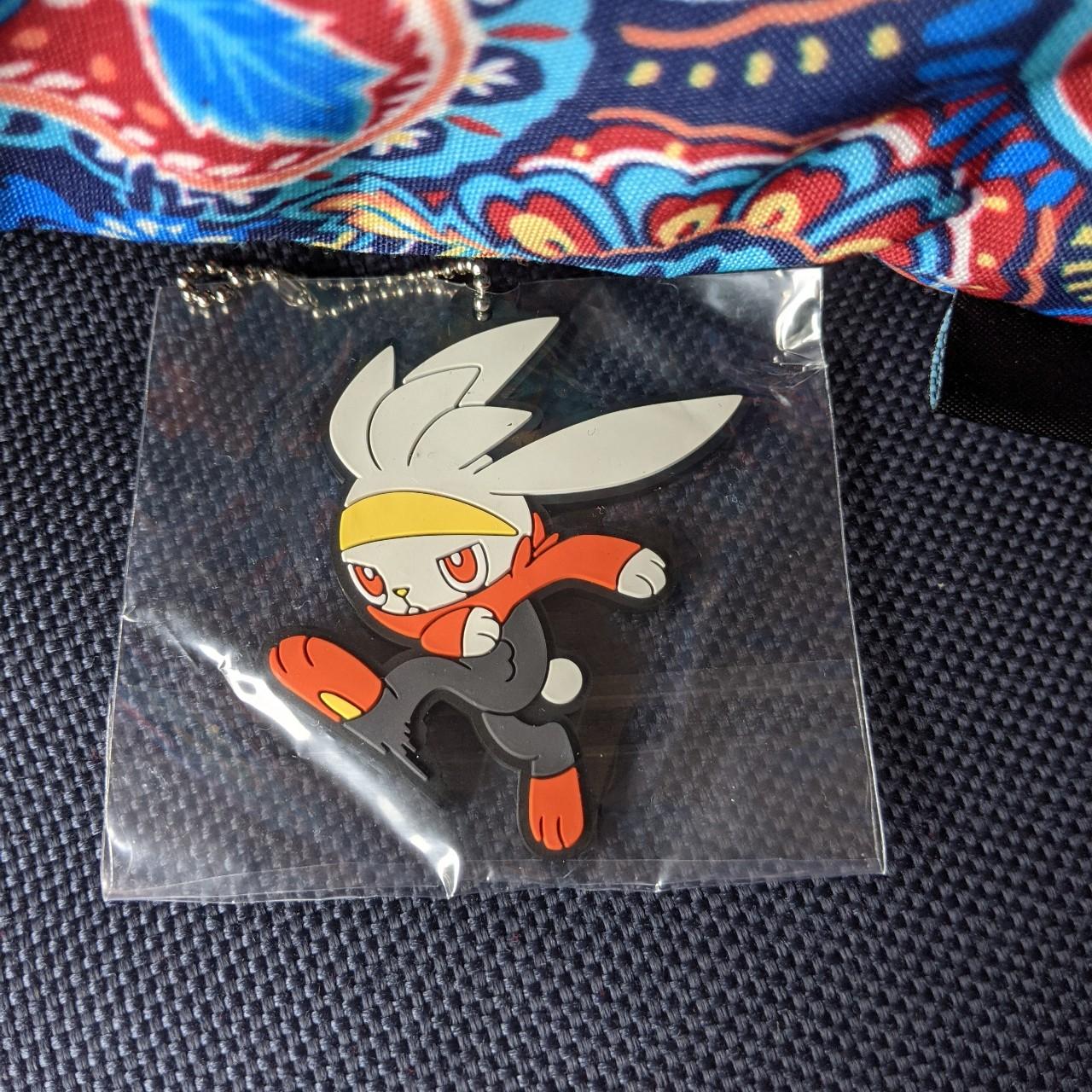 Raboot rubber strap keychain from pokemon sword and... - Depop