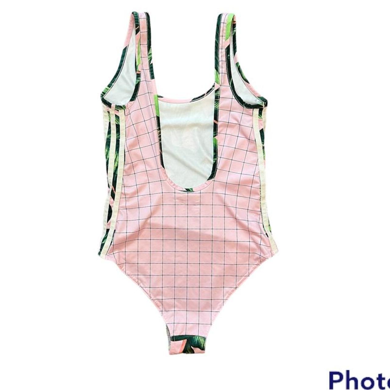 Adidas small bodysuit/bathing suit. Low dip back,... - Depop