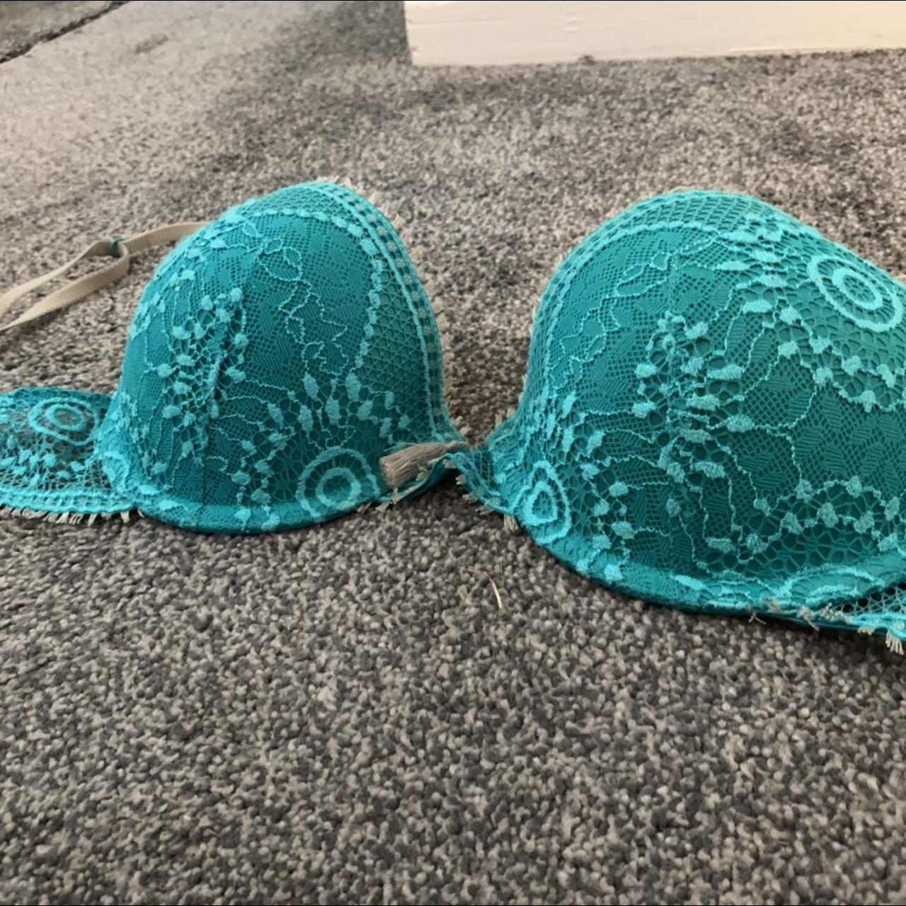 Turquoise lace bra with detailing, slight push up... - Depop