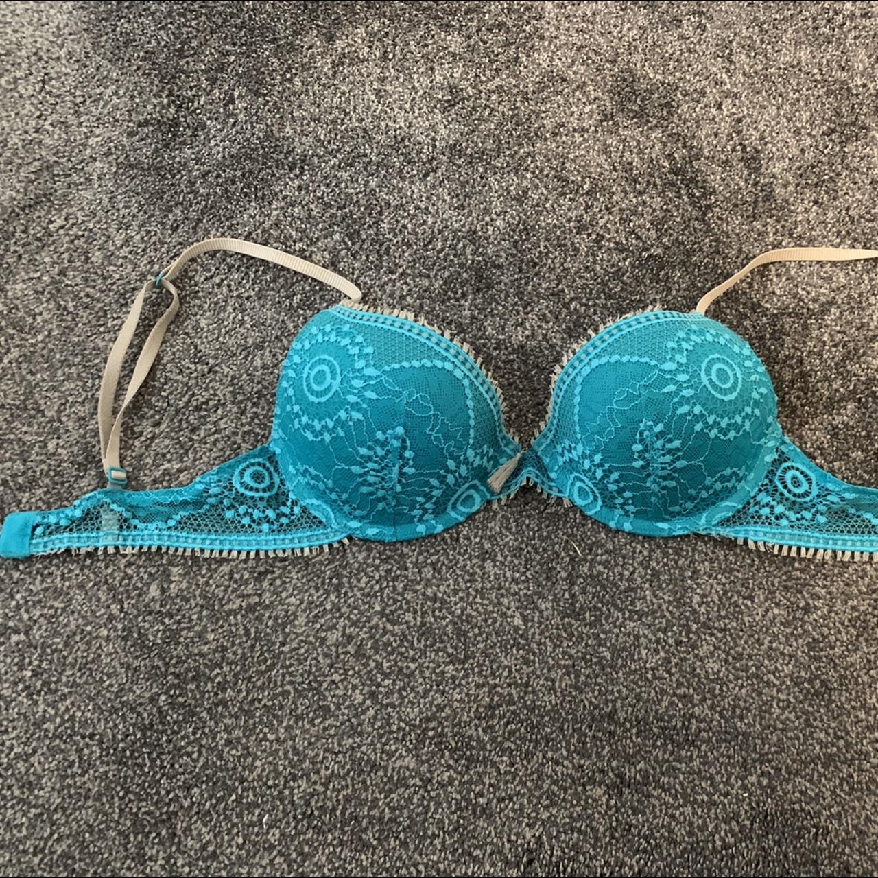 Turquoise lace bra with detailing, slight push up... - Depop