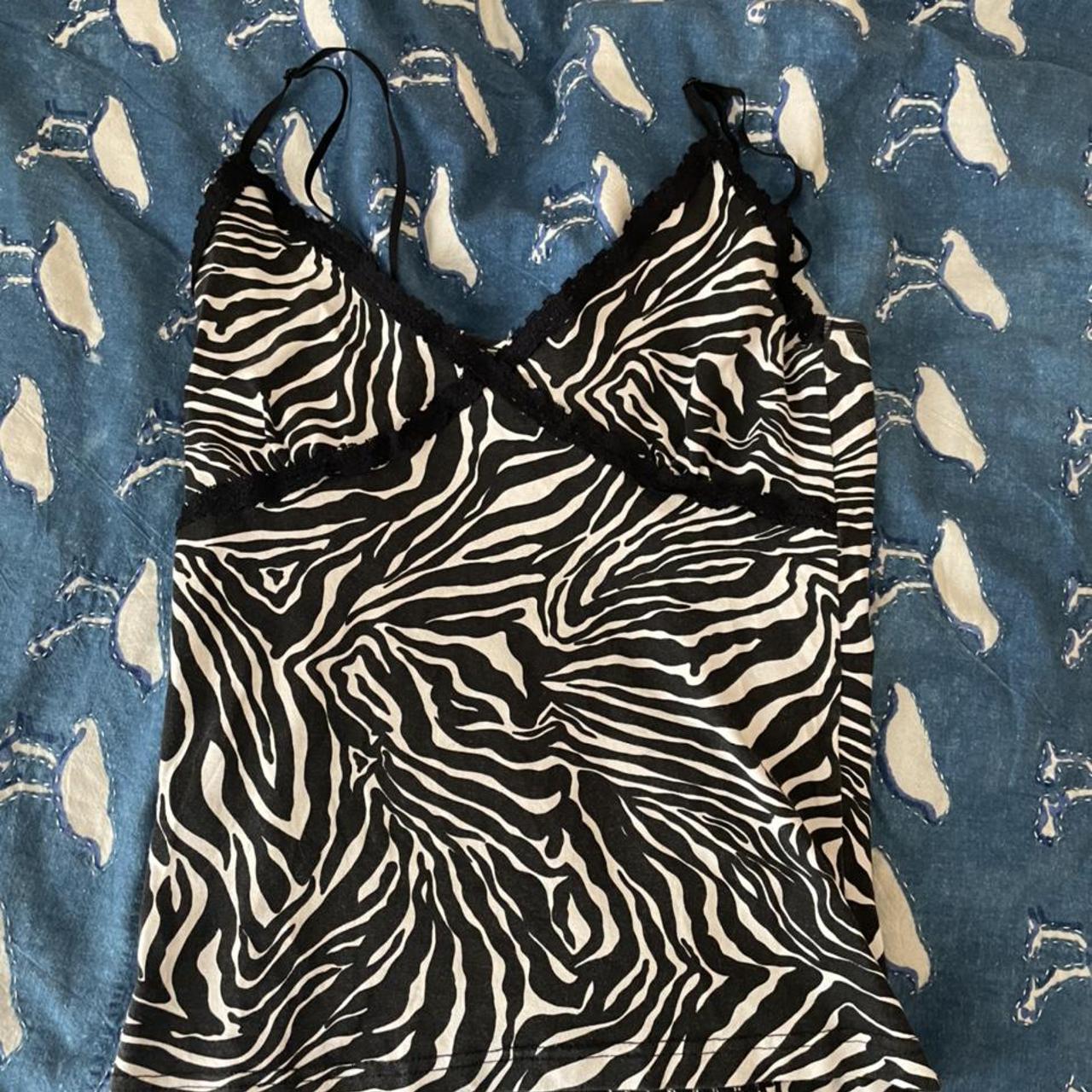 the cutest french zebra top with black lace crossing... - Depop