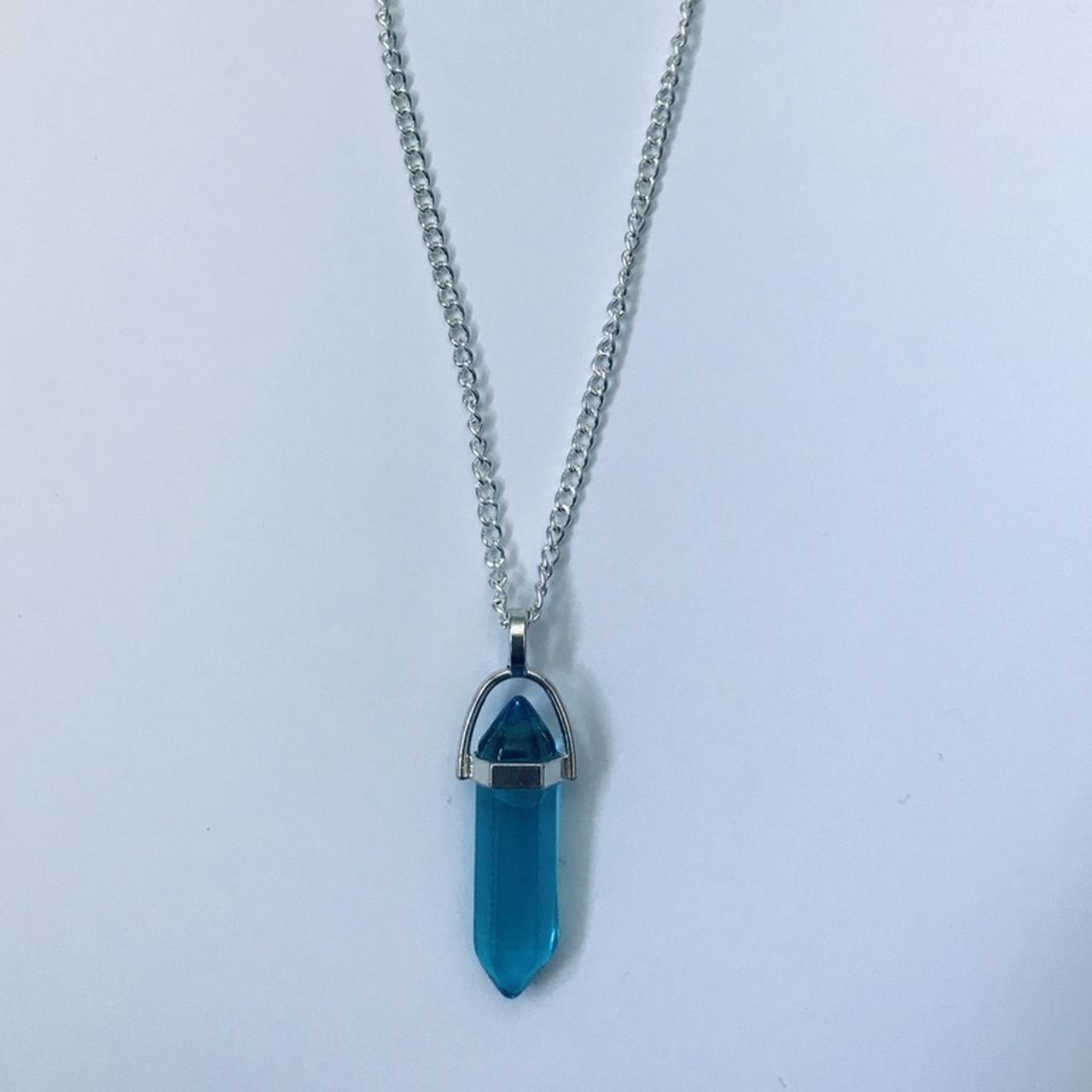 Blue glass chakra healing crystal on 18” silver... - Depop