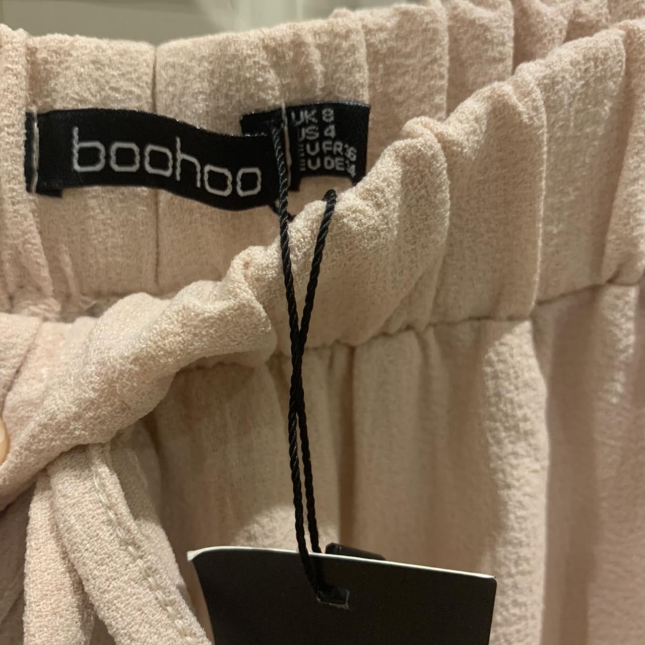 BRAND NEW WITH TAGS. Pale pink Boohoo 3/4 length... - Depop