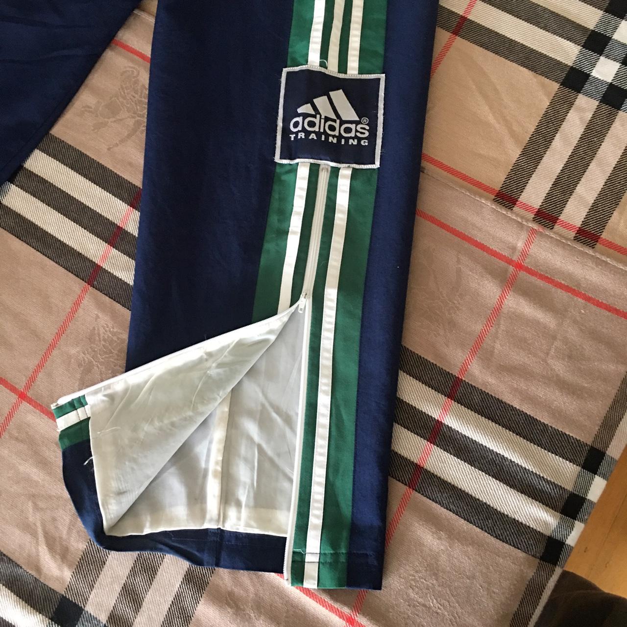 Adidas training tracksuit pants With zips at the... - Depop