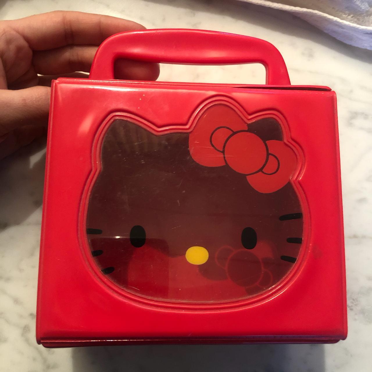 Red Hello kitty plastic cuboid purse - Depop