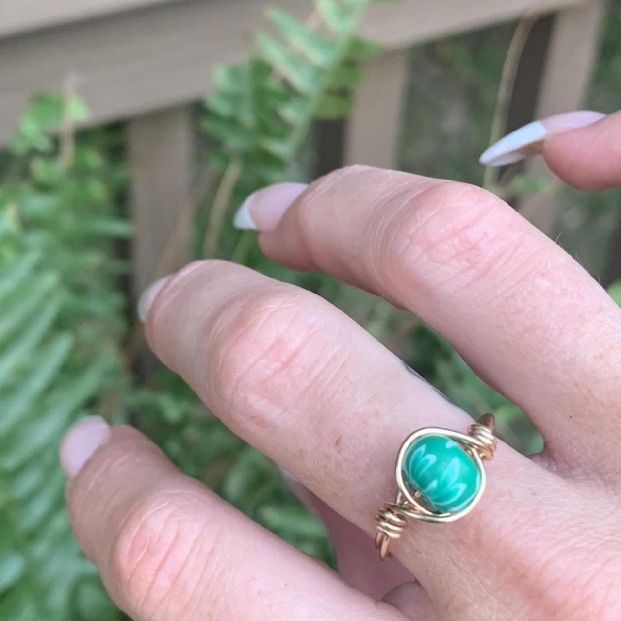 Clay handmade ring. Handmade bead made on a wire... - Depop