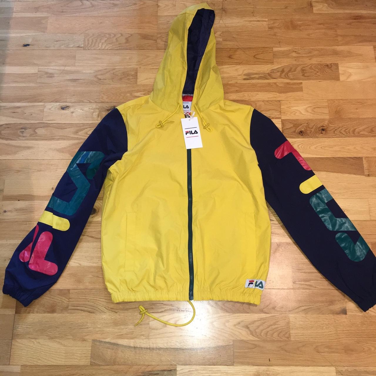 BRAND NEW WITH TAGS FILA YELLOW WATERPROOF JACKET.... | Depop