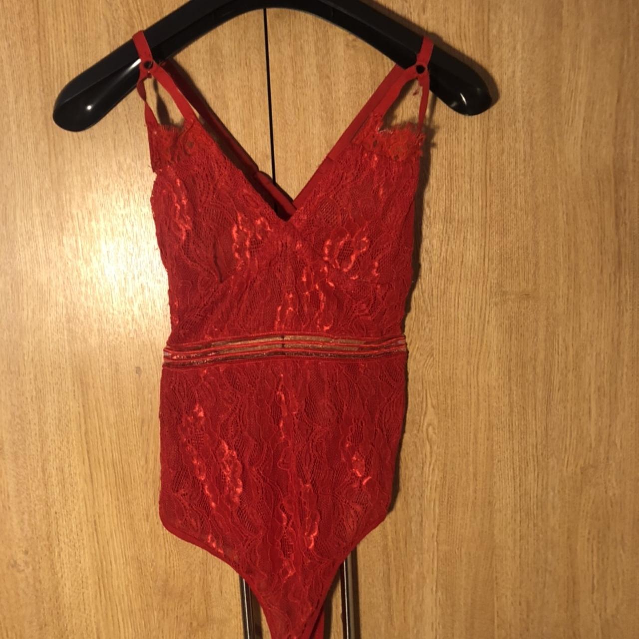 Sexy red backless body suit. Slight rip at top which... - Depop