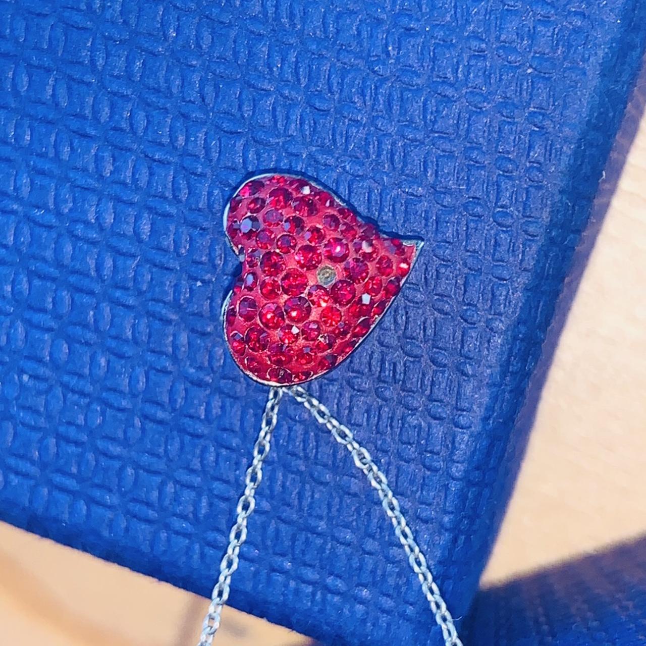 Stunning Swarovski red heart necklace- one small... | Depop
