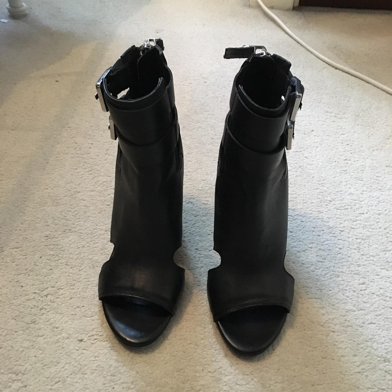 Black open toed boots with side buckled and zip at... - Depop