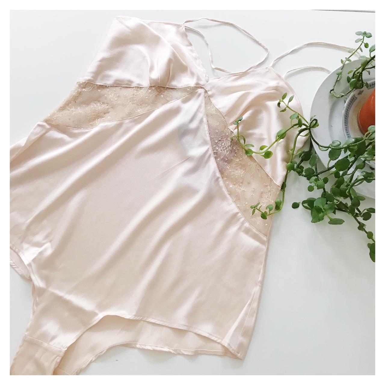 Blush colored bodysuit with rhinestones on mesh... - Depop