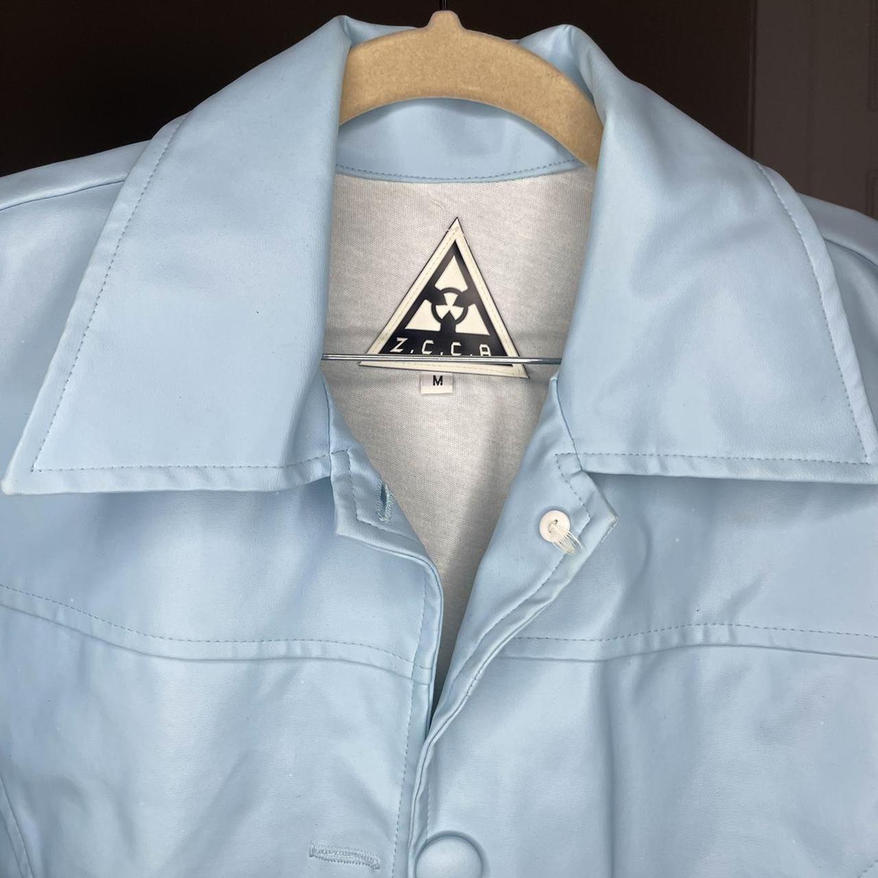 blue vinyl jacket by V.C.C.A. Good condition, size... - Depop