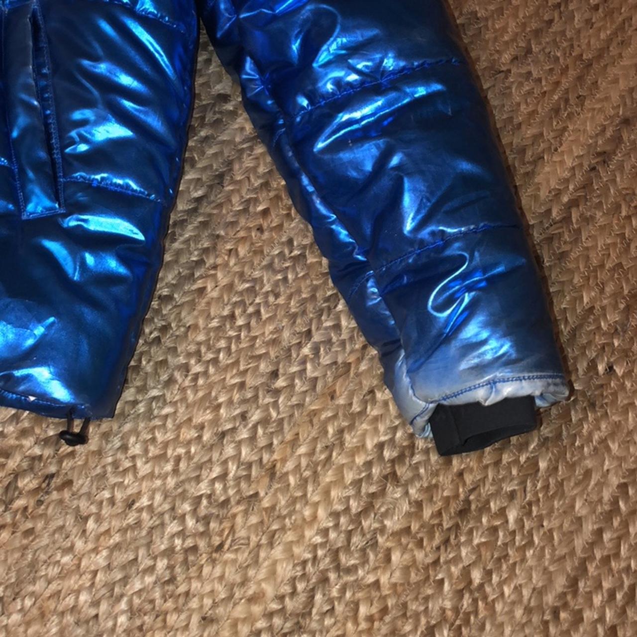 champion metallic electric blue puffer - Depop