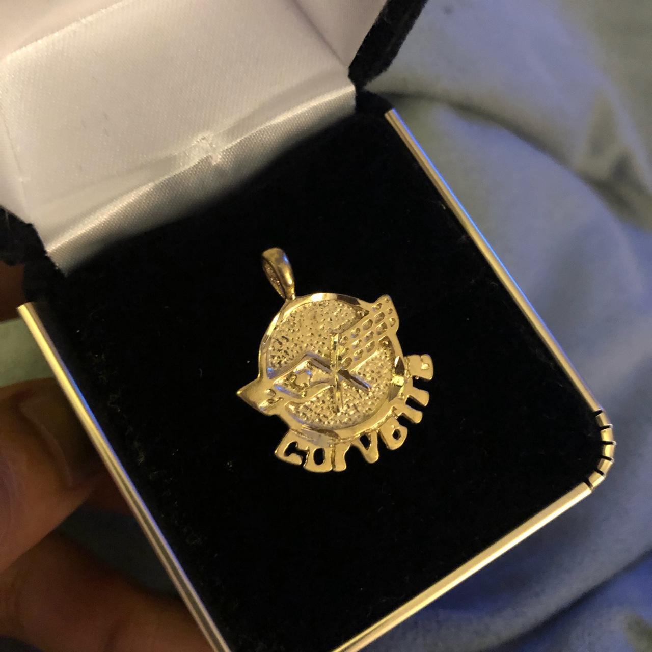 Gold-toned Corvette charm. Super fly 80s - 90s... - Depop