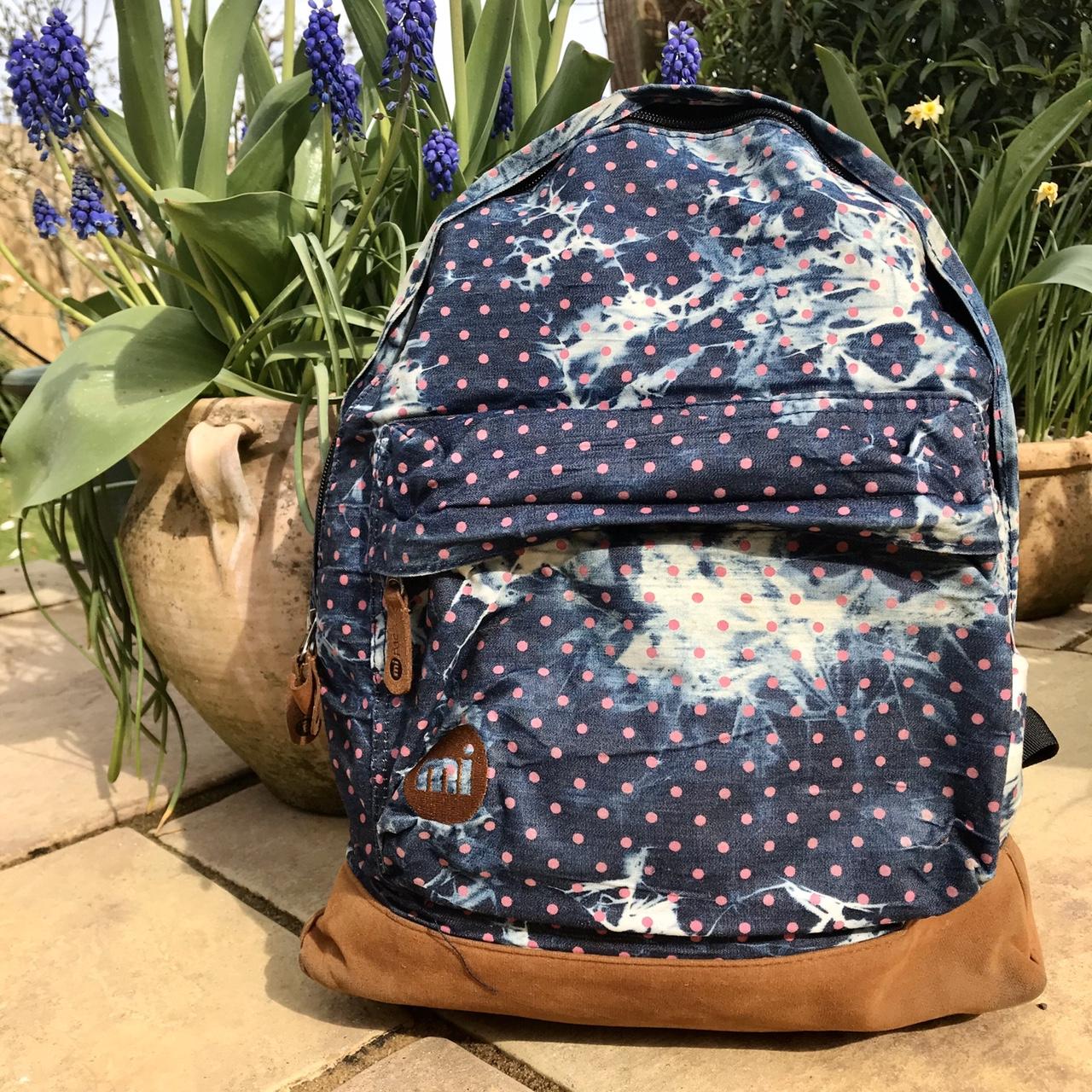 •Mi-Pac rucksack denim acid wash and pink polka dots... - Depop