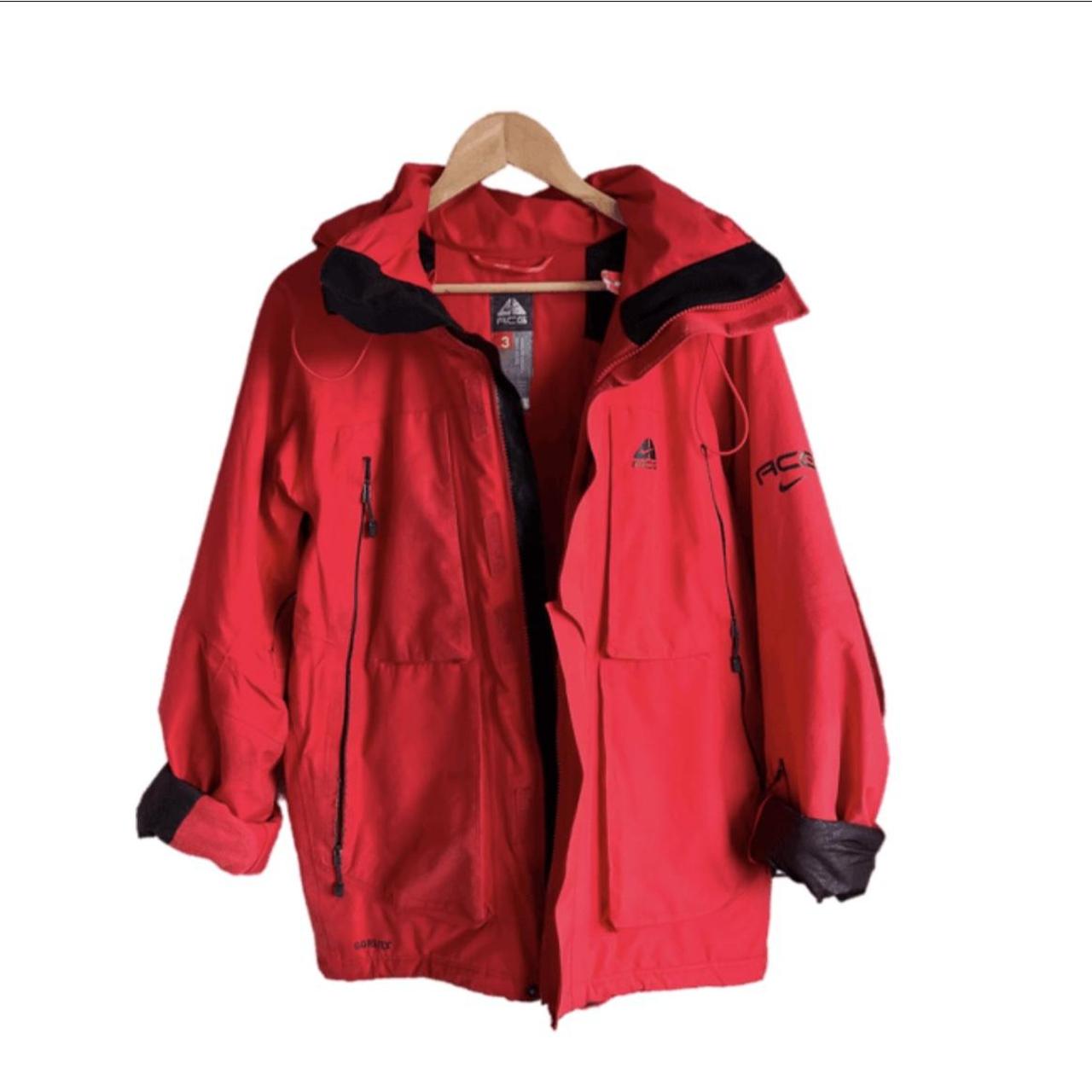 Red Nike ACG Coat size: M has a few signs of wear... - Depop