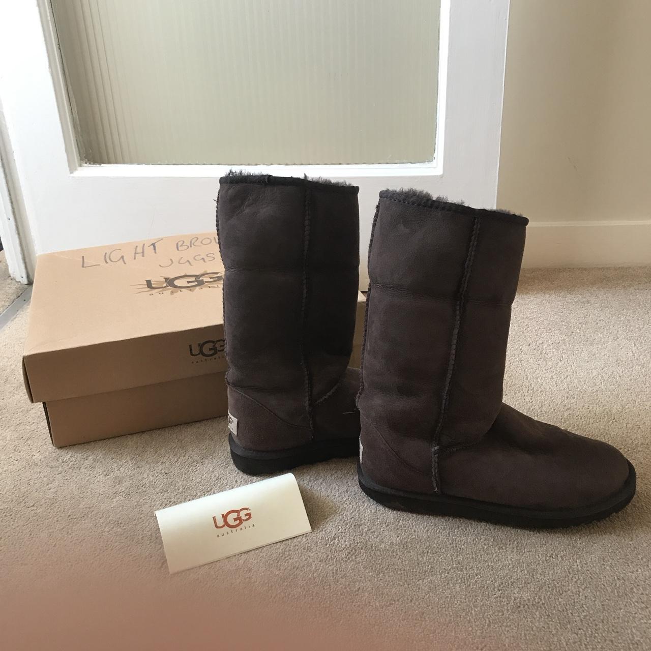 Dark brown tall original uggs, worn but in good... - Depop