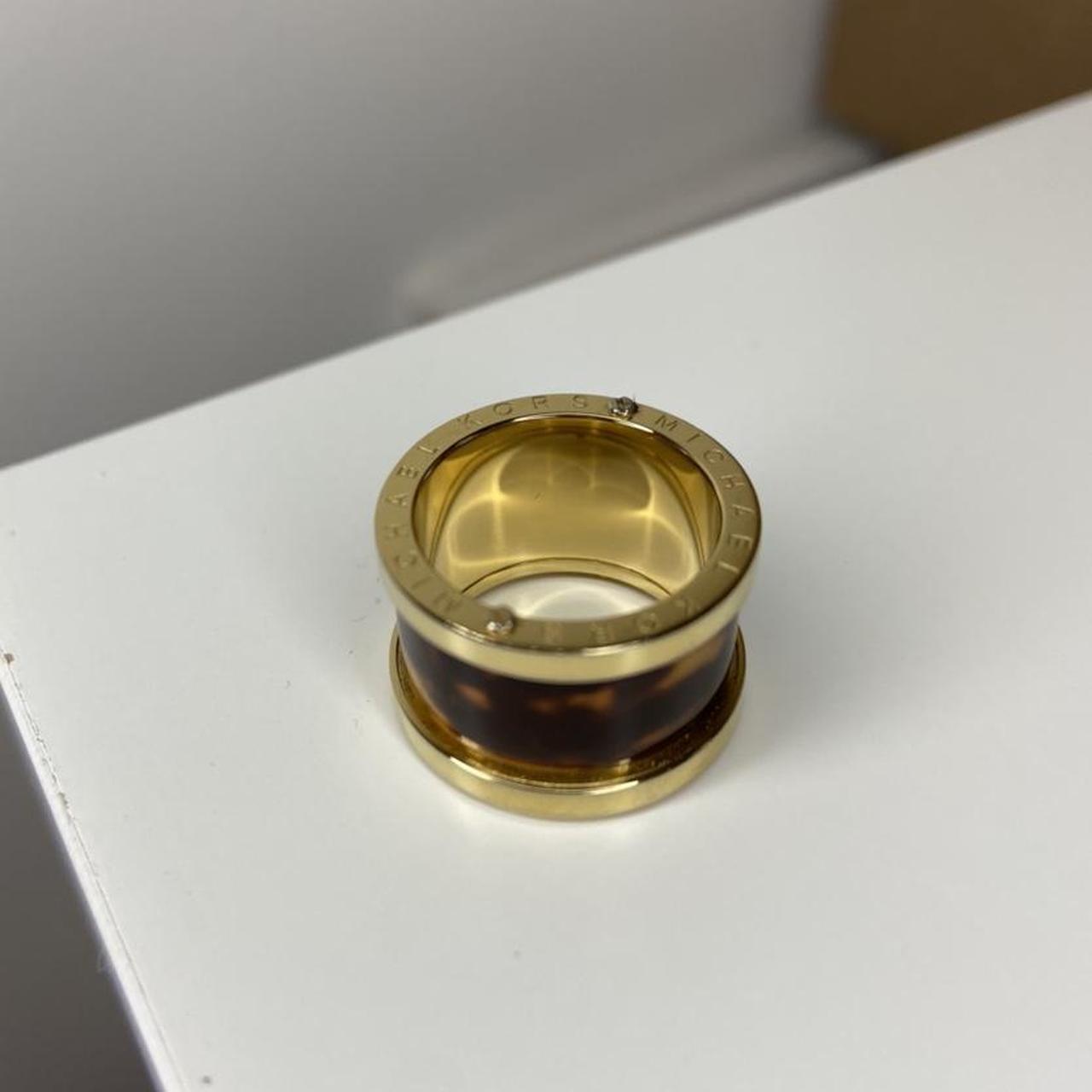 Michael Kors tortoise shell ring. Worn a few times... - Depop