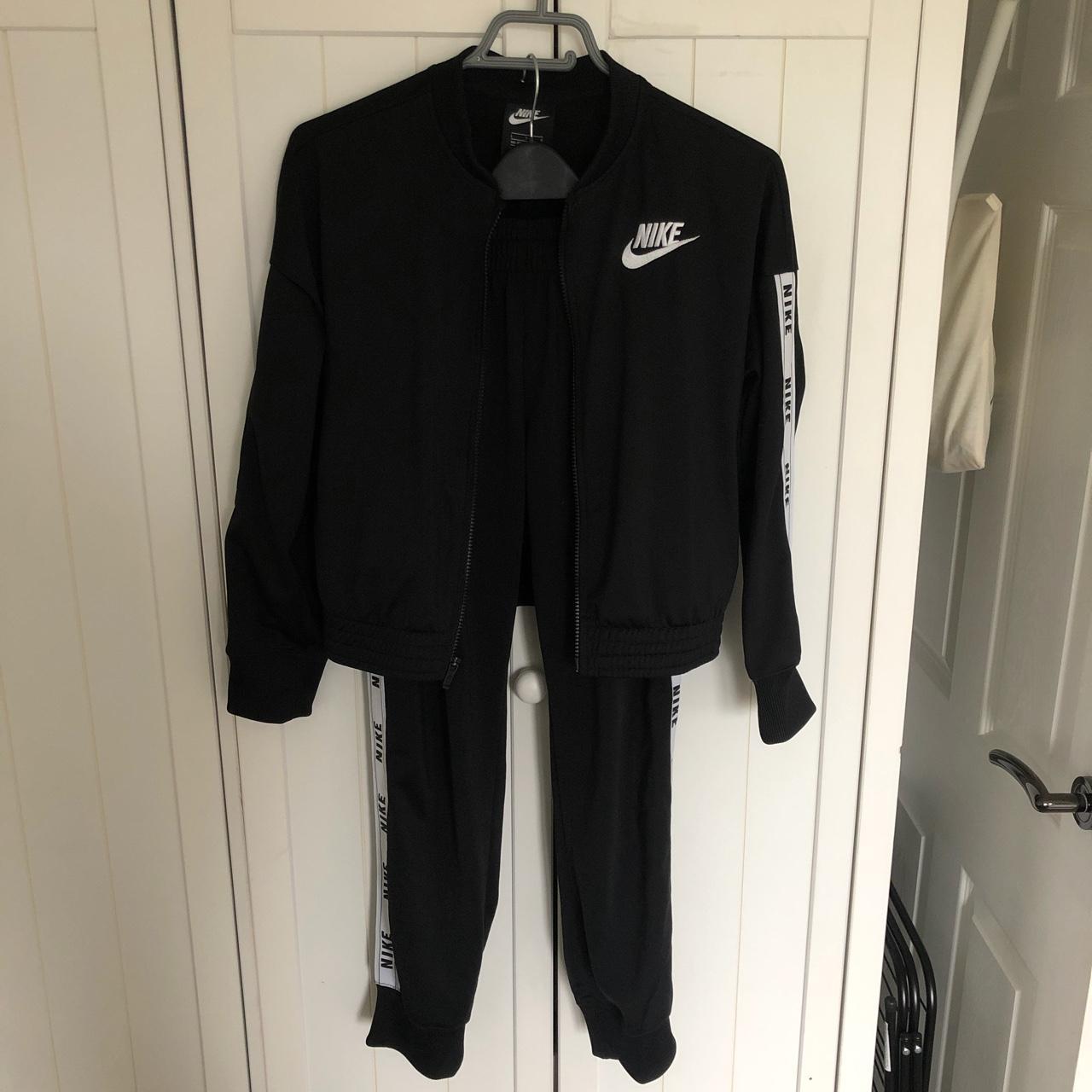 Nike Tracksuit in Black with sleeve and leg detail -... - Depop