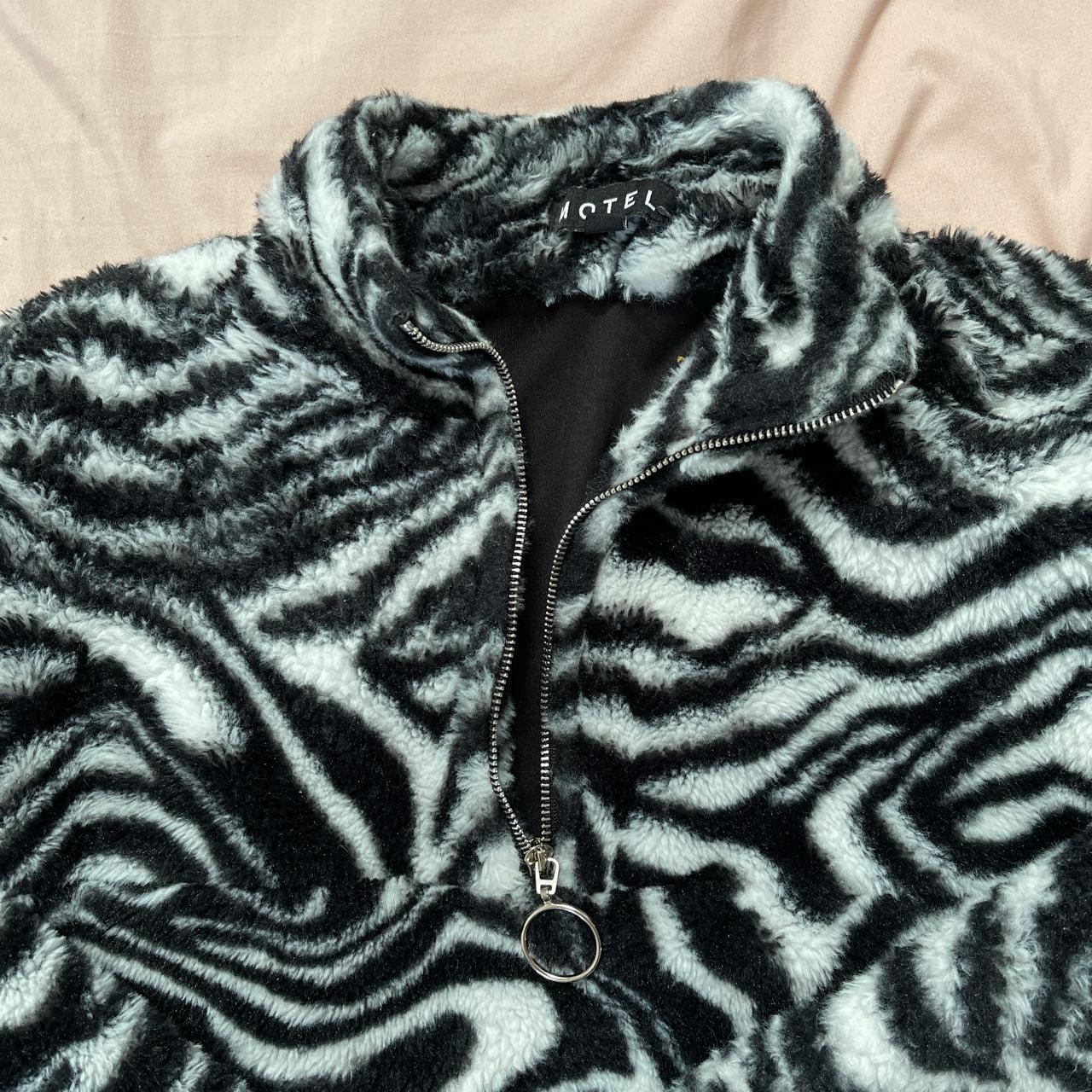 Zebra print sweater. Adjustable drawstring on the... - Depop