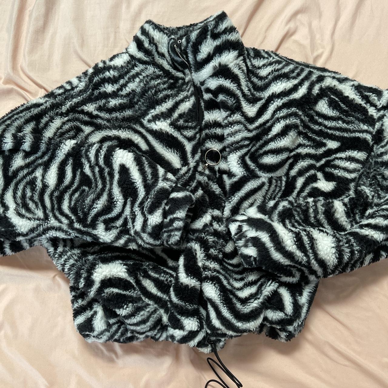 Zebra print sweater. Adjustable drawstring on the... - Depop