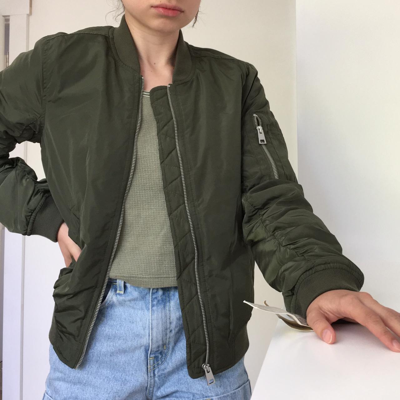 American Rag, green bomber jacket. Never worn, still... - Depop