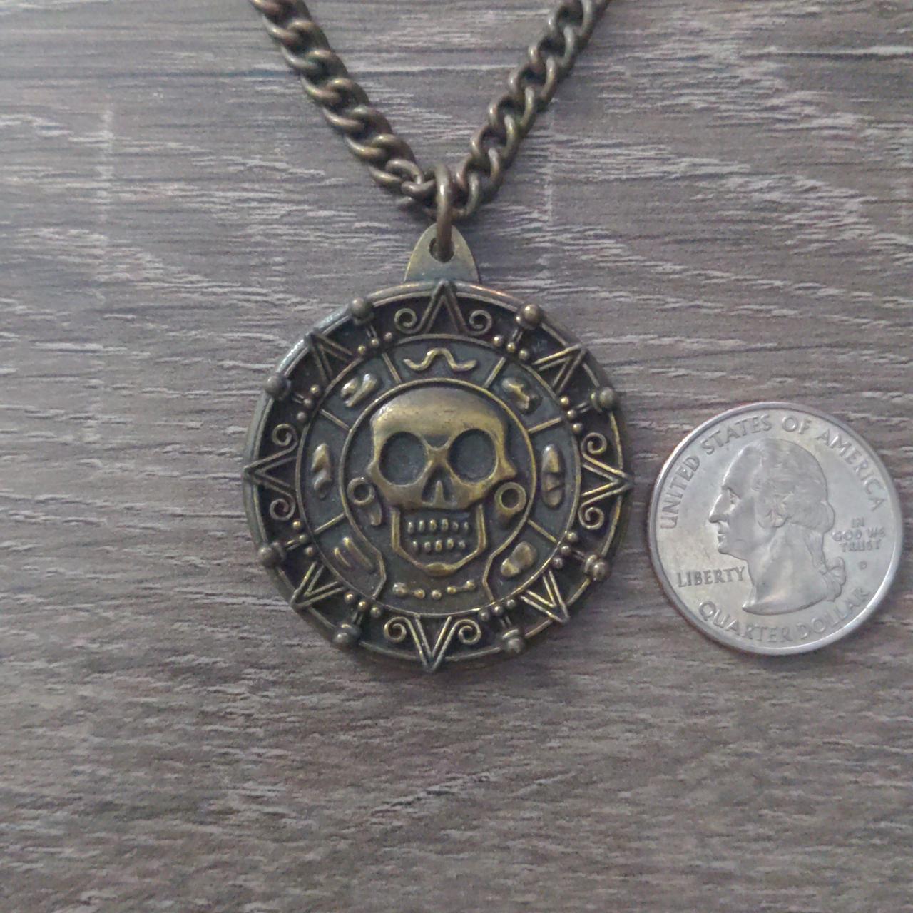 Official Pirates of the Caribbean Cursed Aztec Gold... - Depop