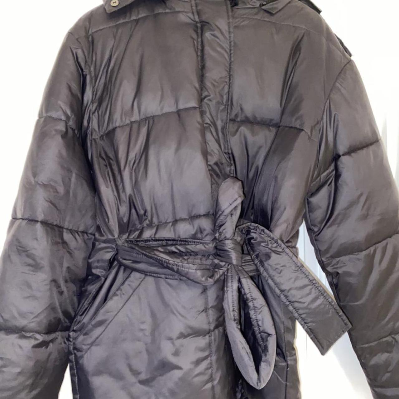 NA-KD fashion black belted puffer coat. Size EU 36... - Depop