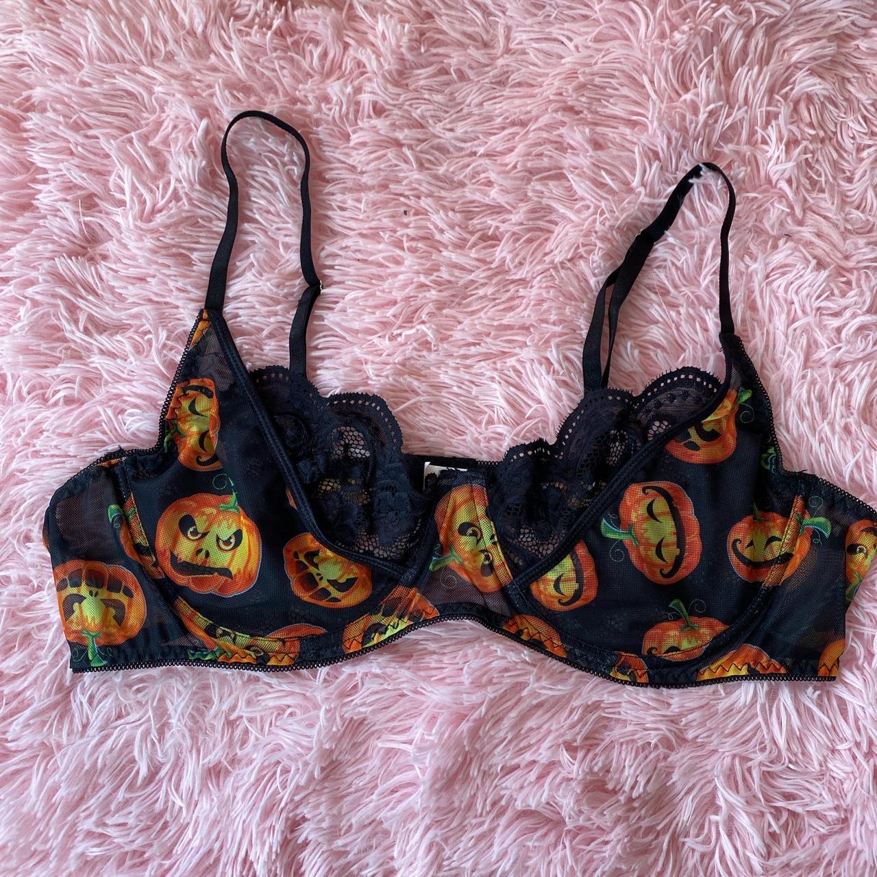 Pumpkin Halloween bra with cute lace detail, tag is... - Depop