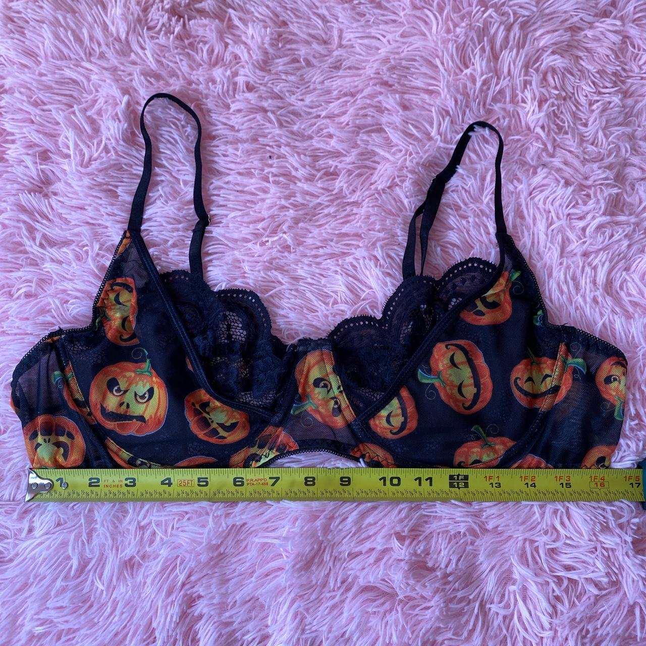 Pumpkin Halloween bra with cute lace detail, tag is... - Depop
