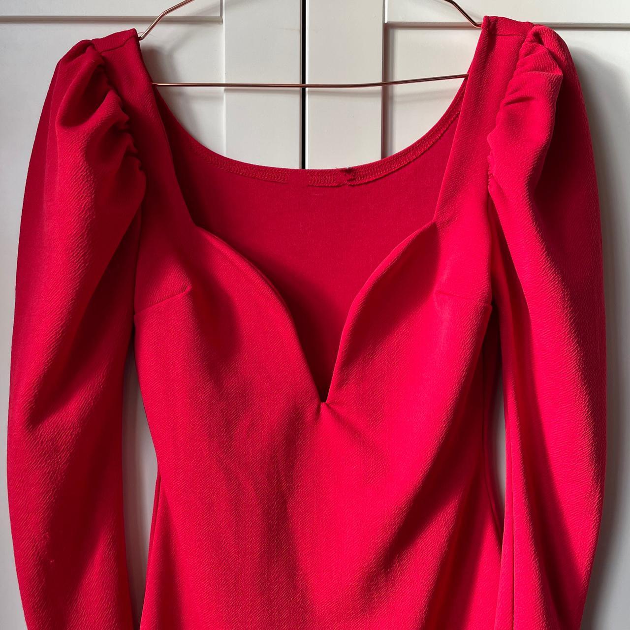 The most incredible plunging red mini dress with... - Depop