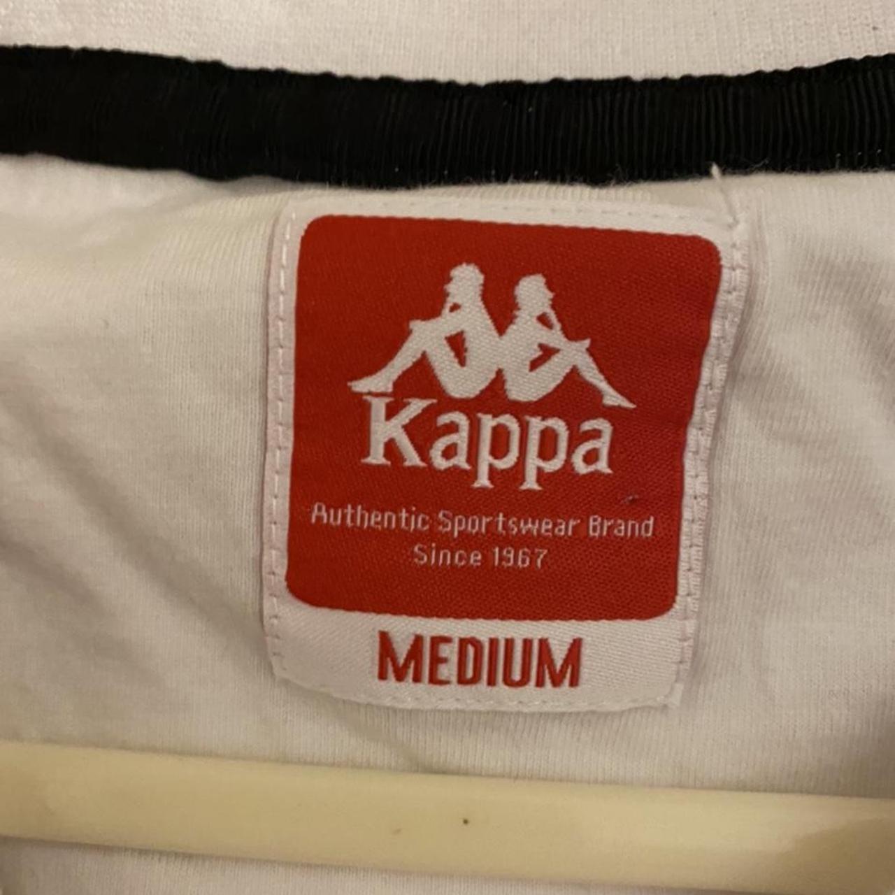 Kappa white t-shirt logo down the side and under... - Depop