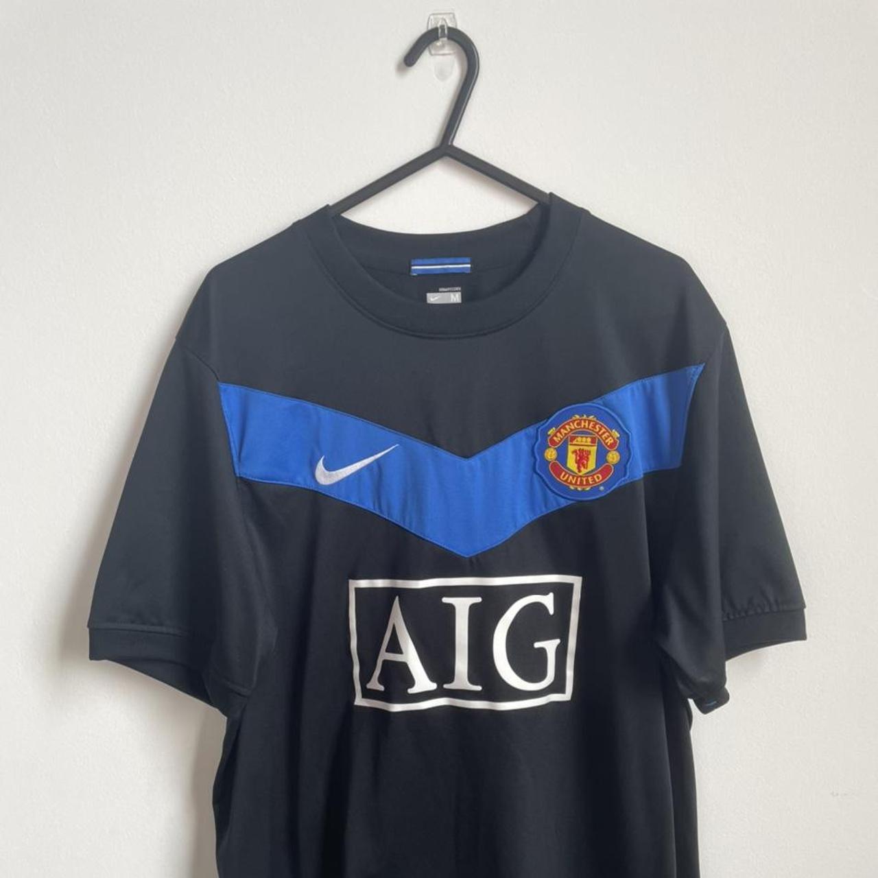 MANCHESTER UNITED Black and Blue away top/jersey by... - Depop