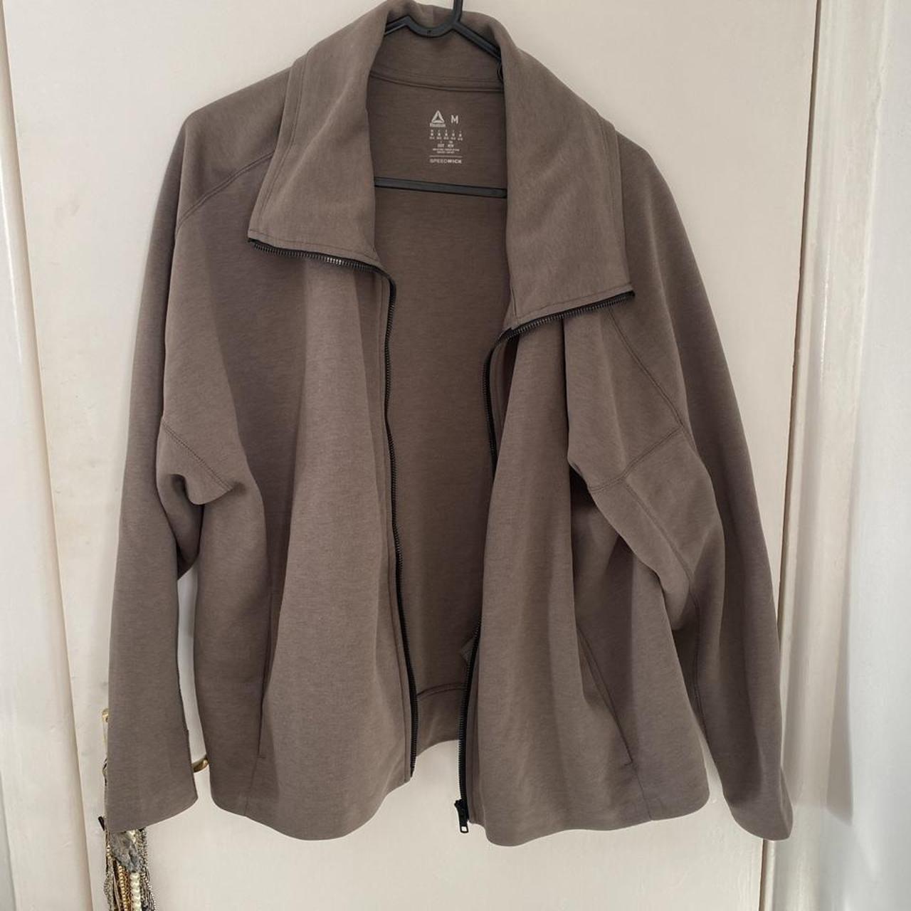 Reebok sports zip up jumper stone with collar Shown... - Depop