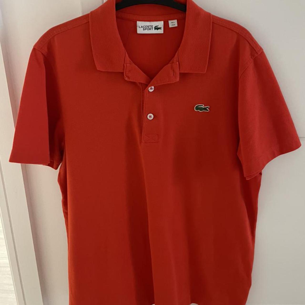 Orange Lacoste polo shirt Perfect condition Fits a... - Depop