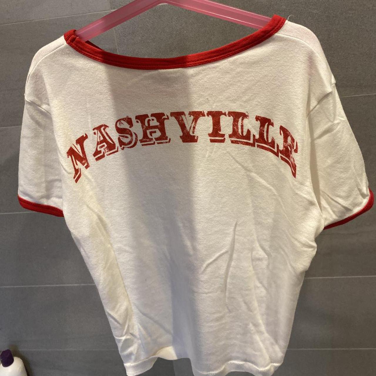 Red and white graphic baby tee from urban... - Depop