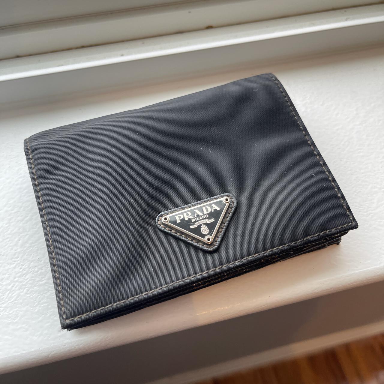 Prada wallet it was very used and shows signs of use - Depop