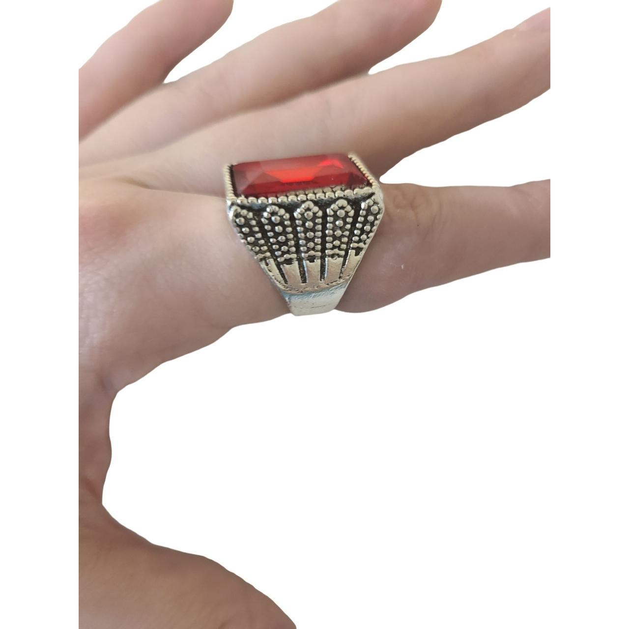 Shiny red crystal ring, size 7. Made of iron alloy.... - Depop