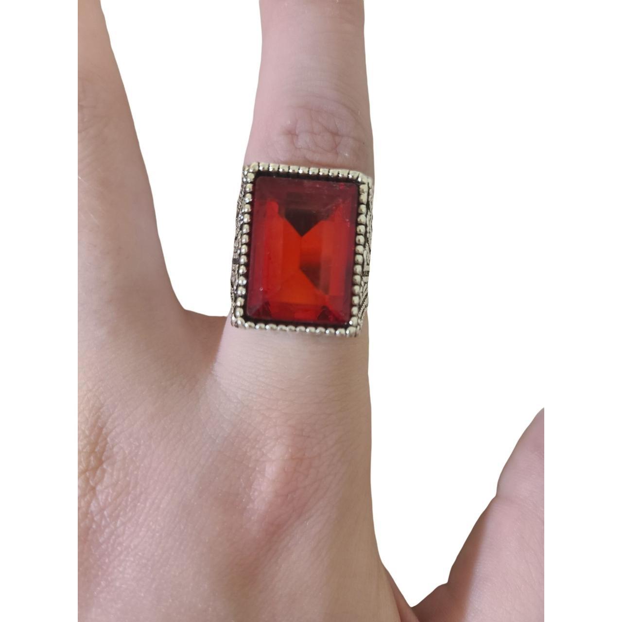 Shiny red crystal ring, size 7. Made of iron alloy.... - Depop