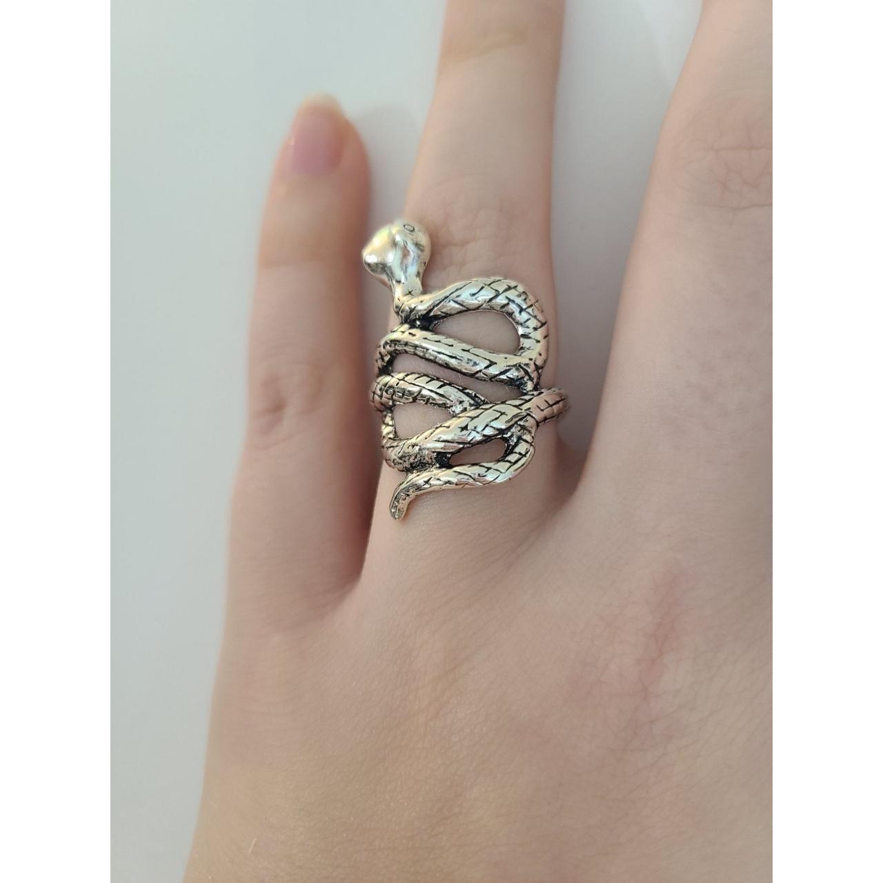 Unique snake ring, size 8 1/2. Made of iron alloy.... - Depop