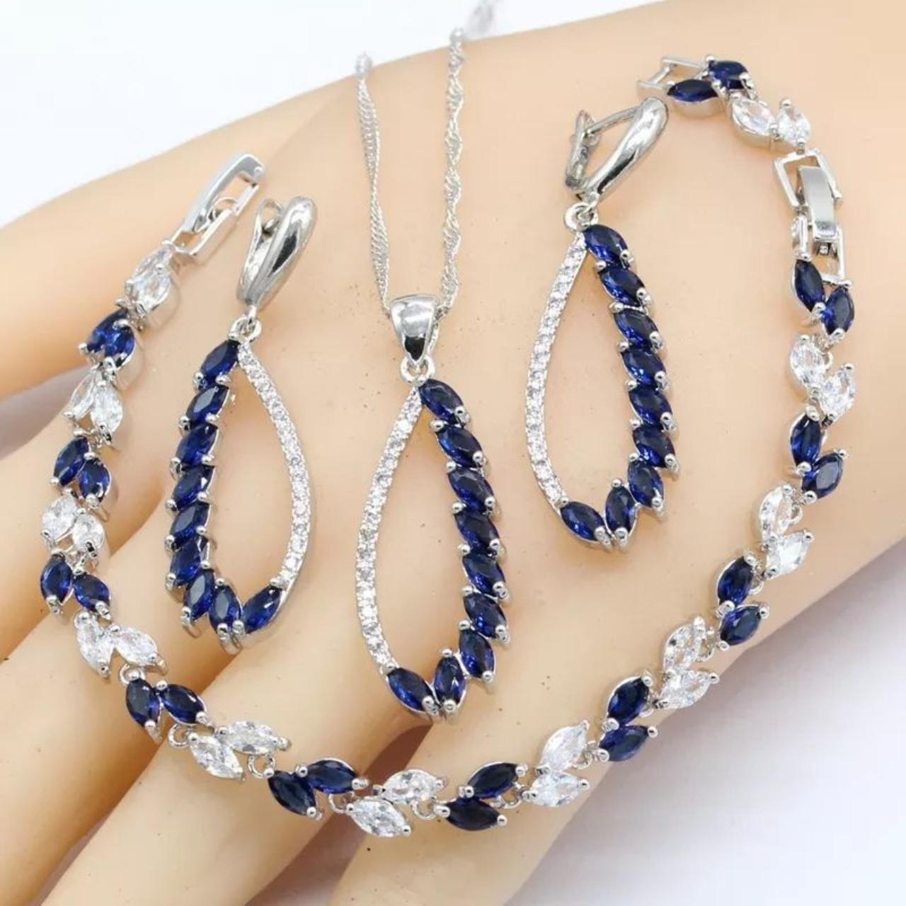 Beautiful blue stone jewelry set. Made of cubic... - Depop