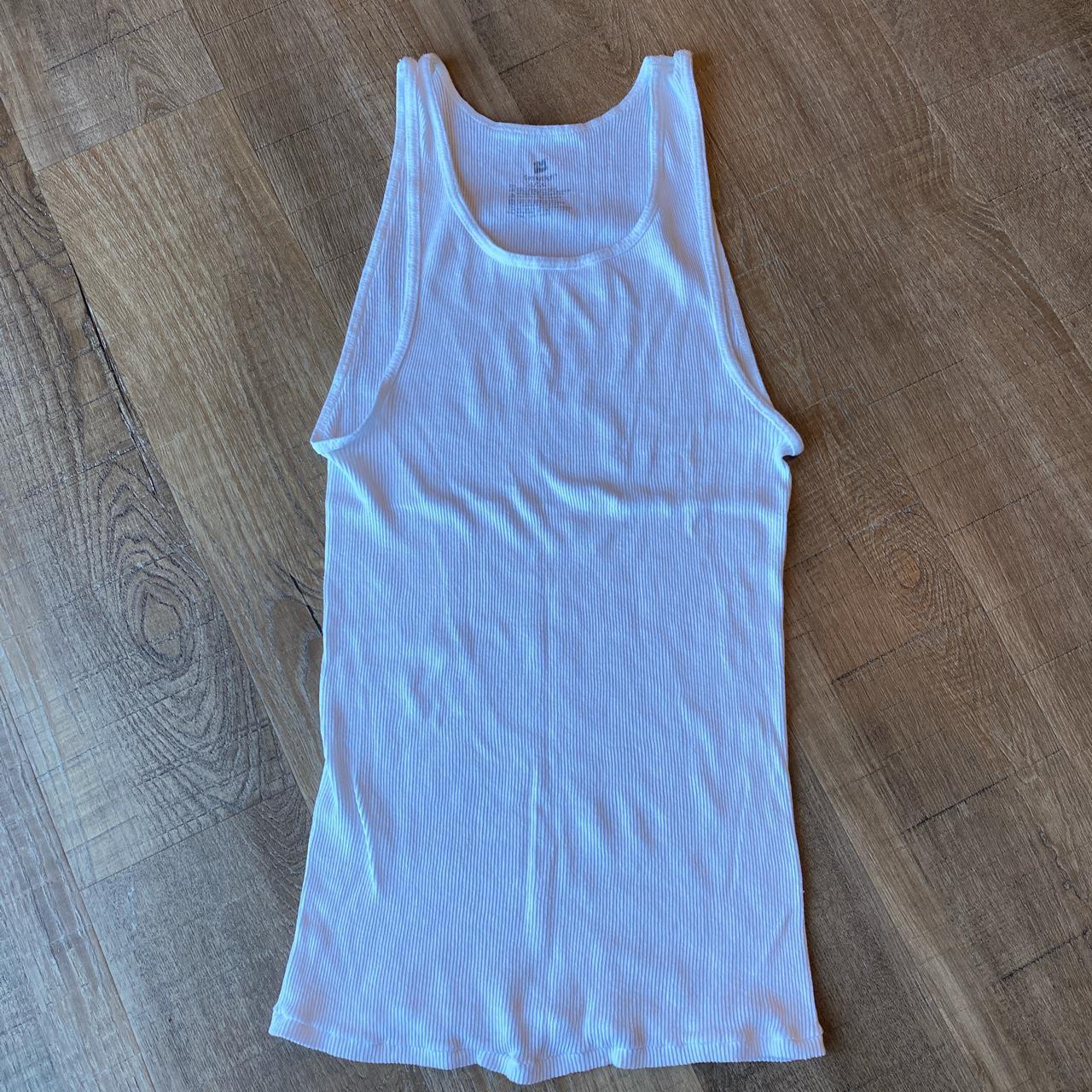 Hanes. Multi pack of sleeveless white T-shirts.... - Depop